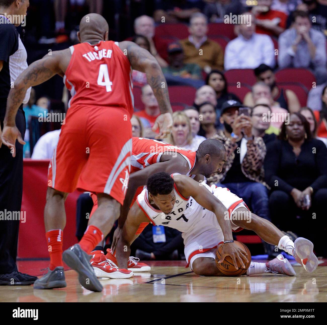 Houston Rockets forward Luc Mbah a Moute (12) and Toronto Raptors guard ...