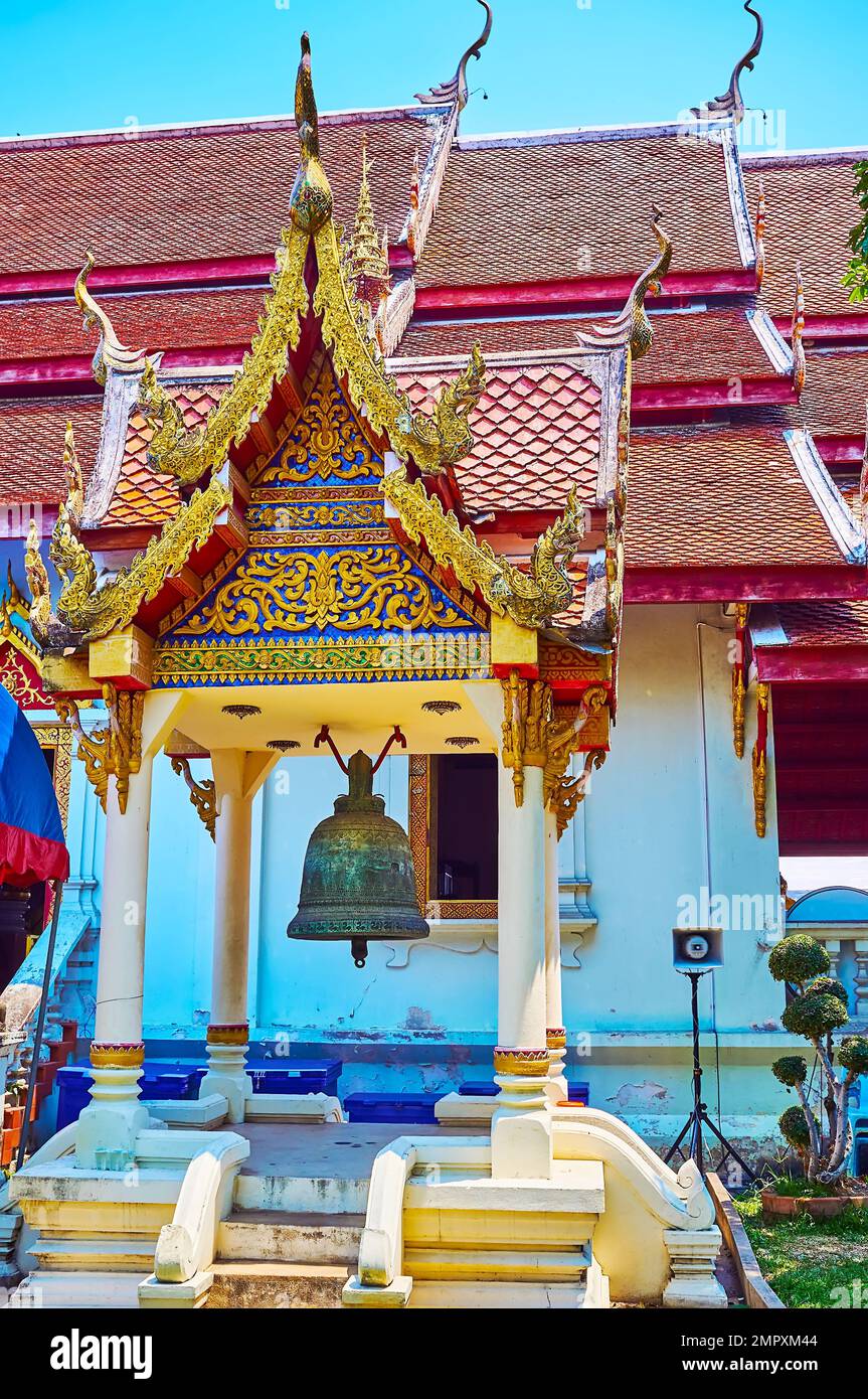 The beautiful Ho Rakang belfry of Wat Phra Singh with pyathat (multi ...