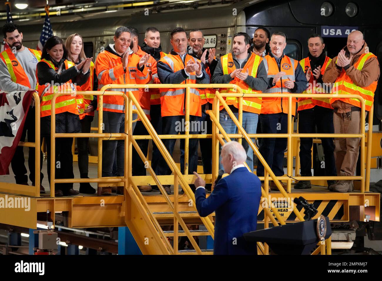 MTA employees applaud President Joe Biden as he speaks during at the ...