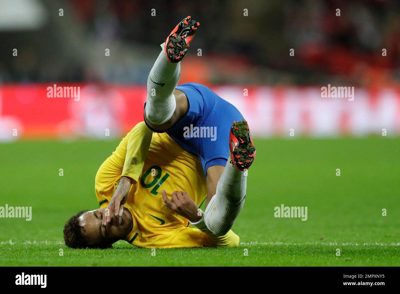 Brazil's Neymar falls during the international friendly soccer match ...