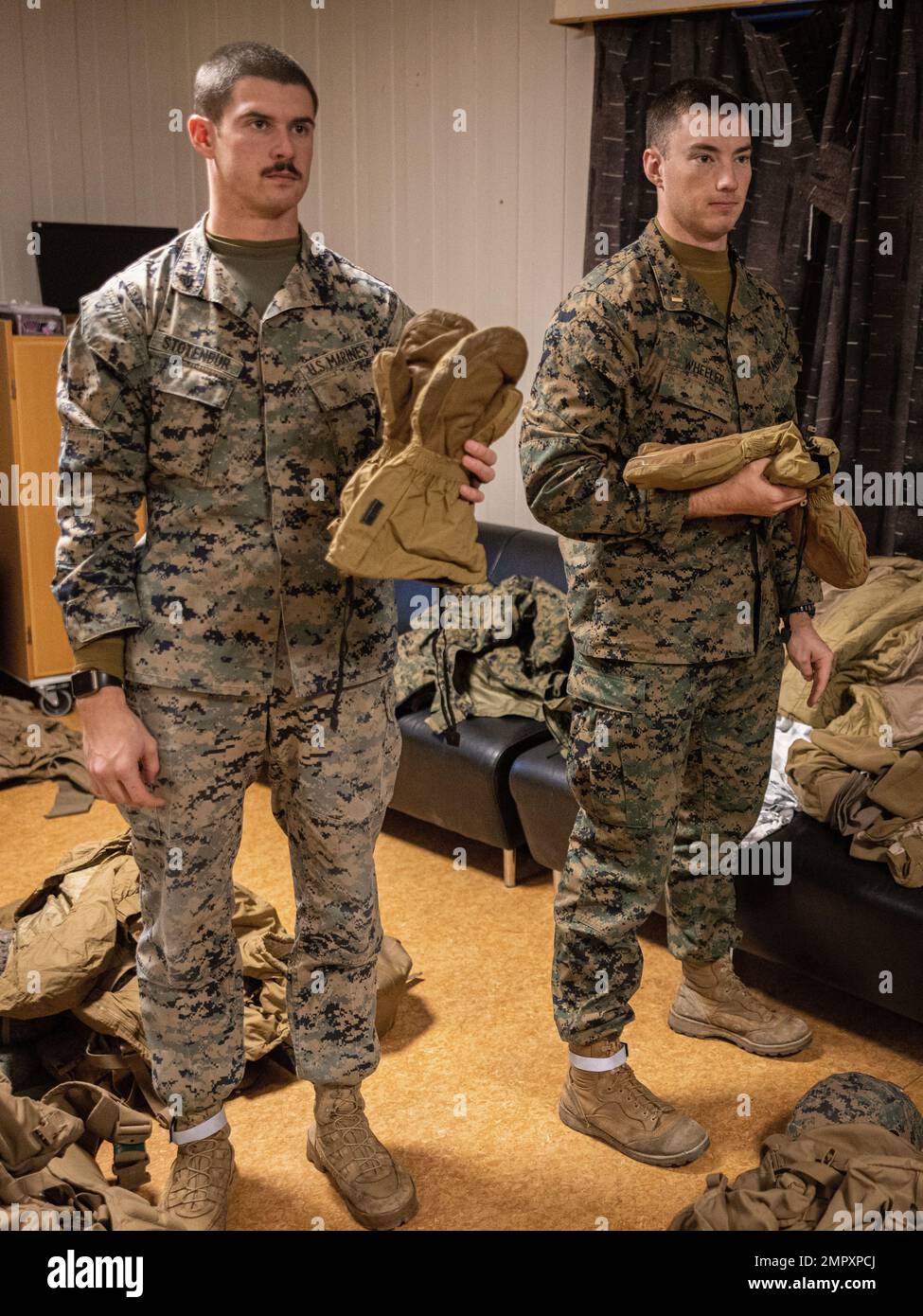 U.S. Marine Corps Cpl. Mason D. Stotenbur, left, a Lansing, Michigan ...