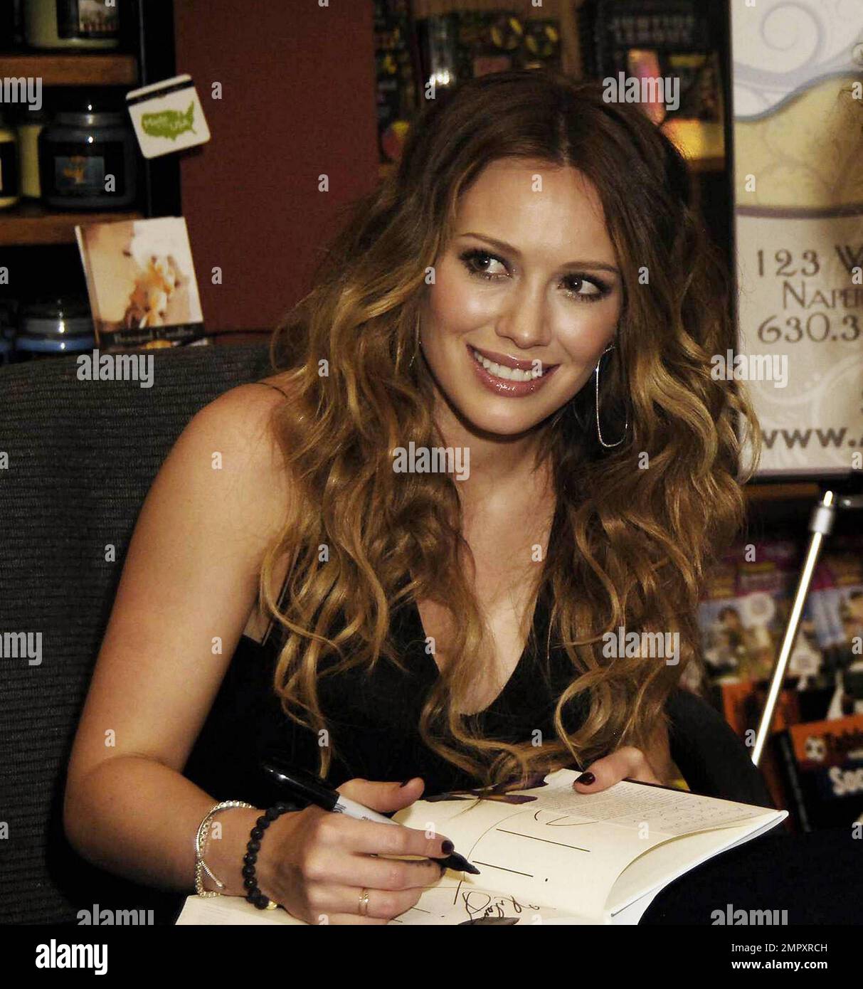 Actress Hilary Duff signed copies of her new book, ÒElixir,Ó for nearly ...