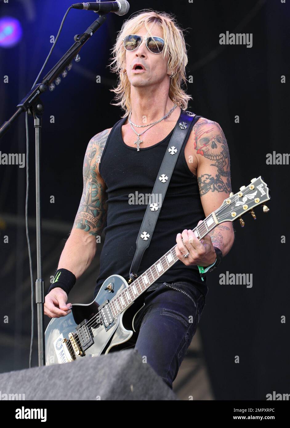 Duff McKagan, normally on bass, plays guitar and sings in his own ...