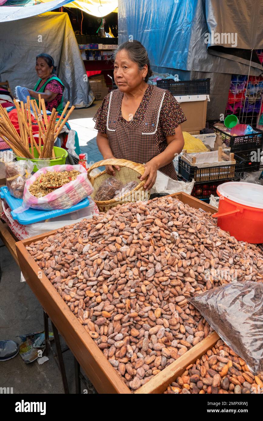 An indigenous Zapotec woman selling cacao beans in the market in ...