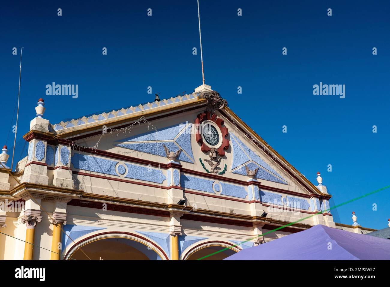 Colorful facade of the municipal palace in the market town of Ocotlan ...