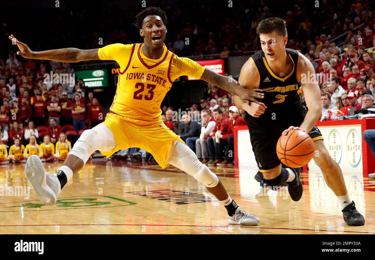 Milwaukee guard Brock Stull drives past Iowa State forward Zoran Talley ...