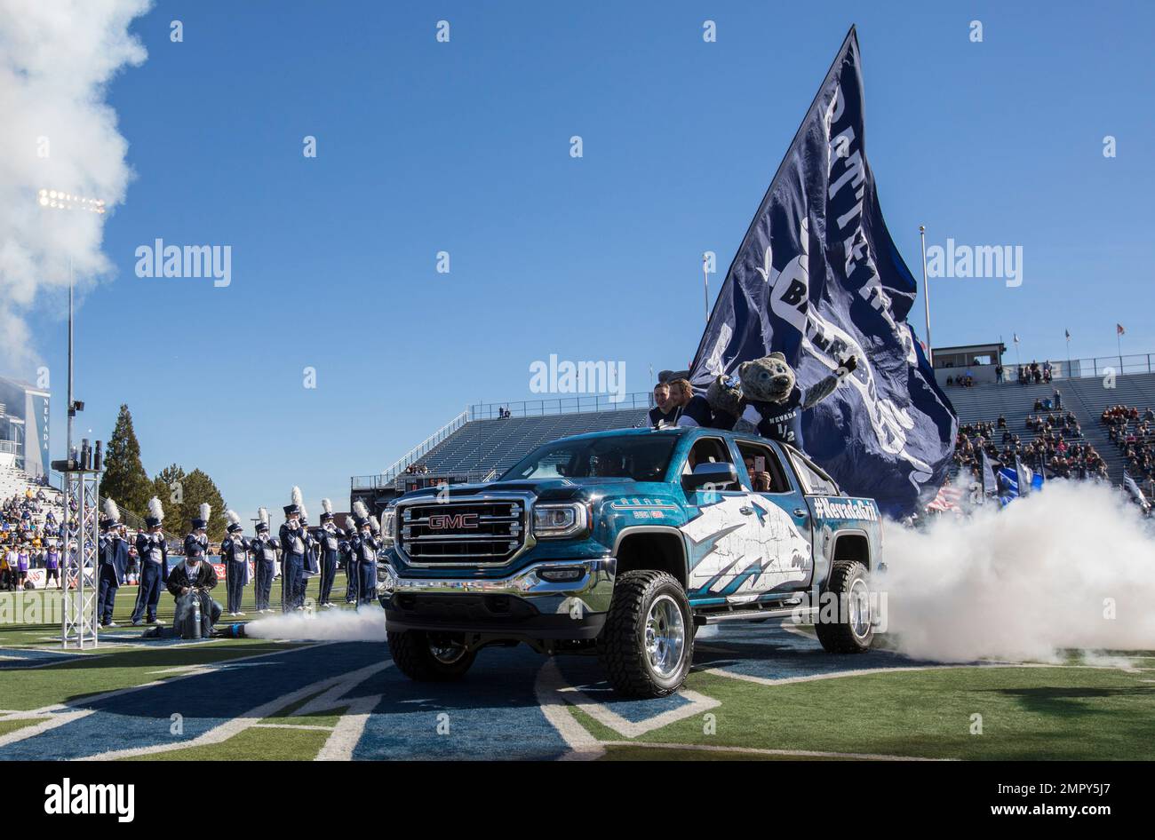 The Nevada football team takes the field before their NCAA college ...