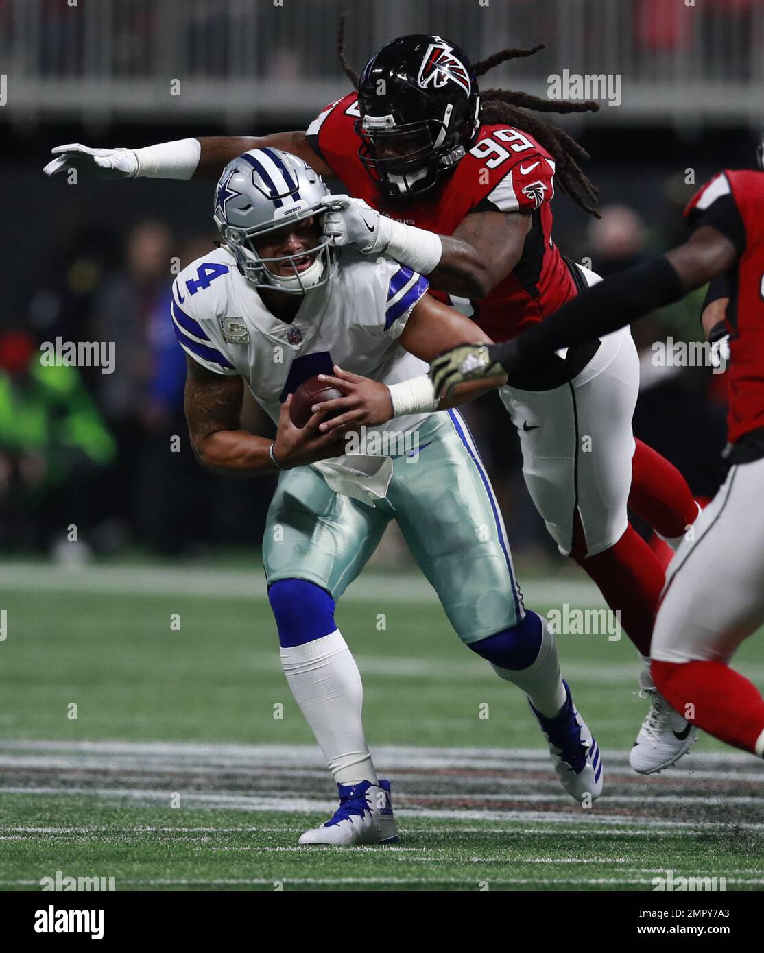 Dallas Cowboys quarterback Dak Prescott (4) is sacked by Atlanta ...