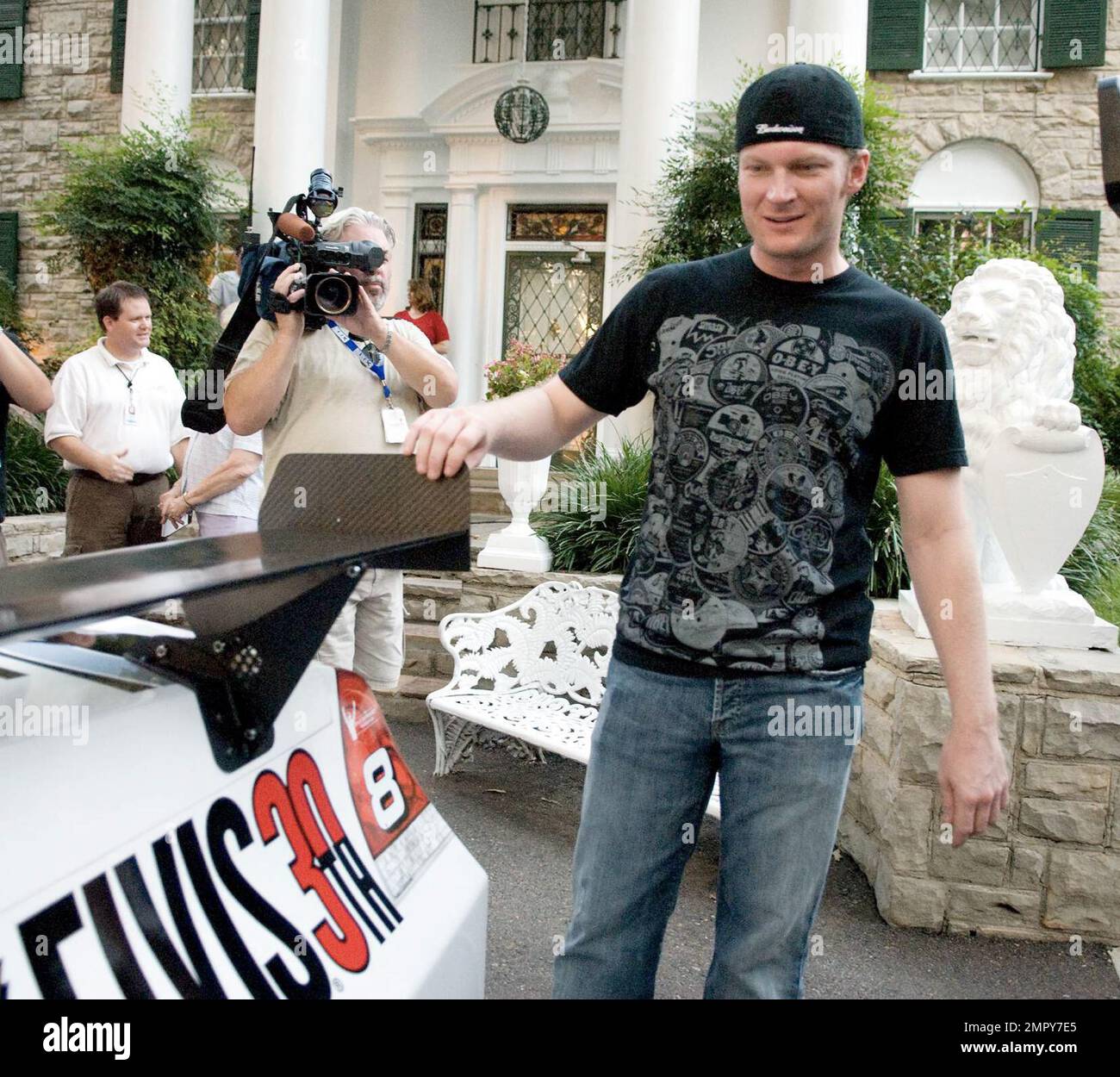 Dale Earnhardt Jr., along with his mother and grandmother, open the ...