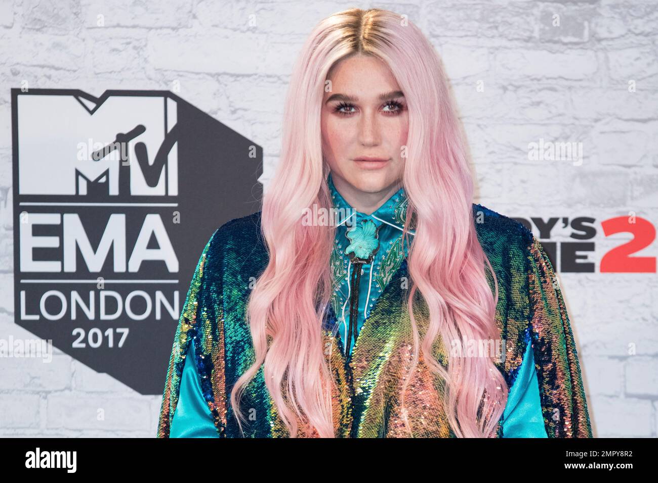 Kesha poses for photographers backstage at the MTV European Music ...