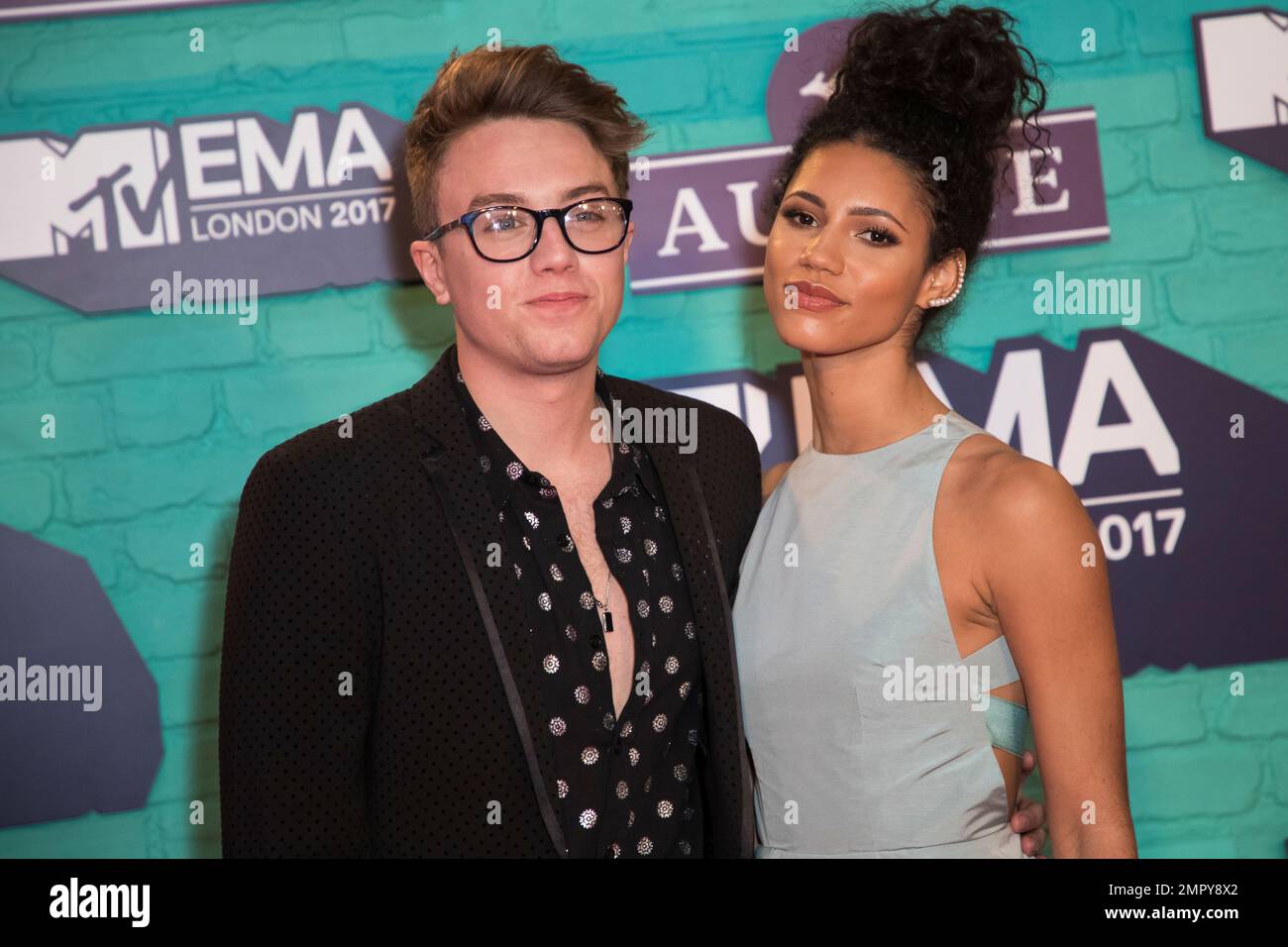 Roman Kemp and Victoria Nwosu-Hope pose for photographers upon arrival ...