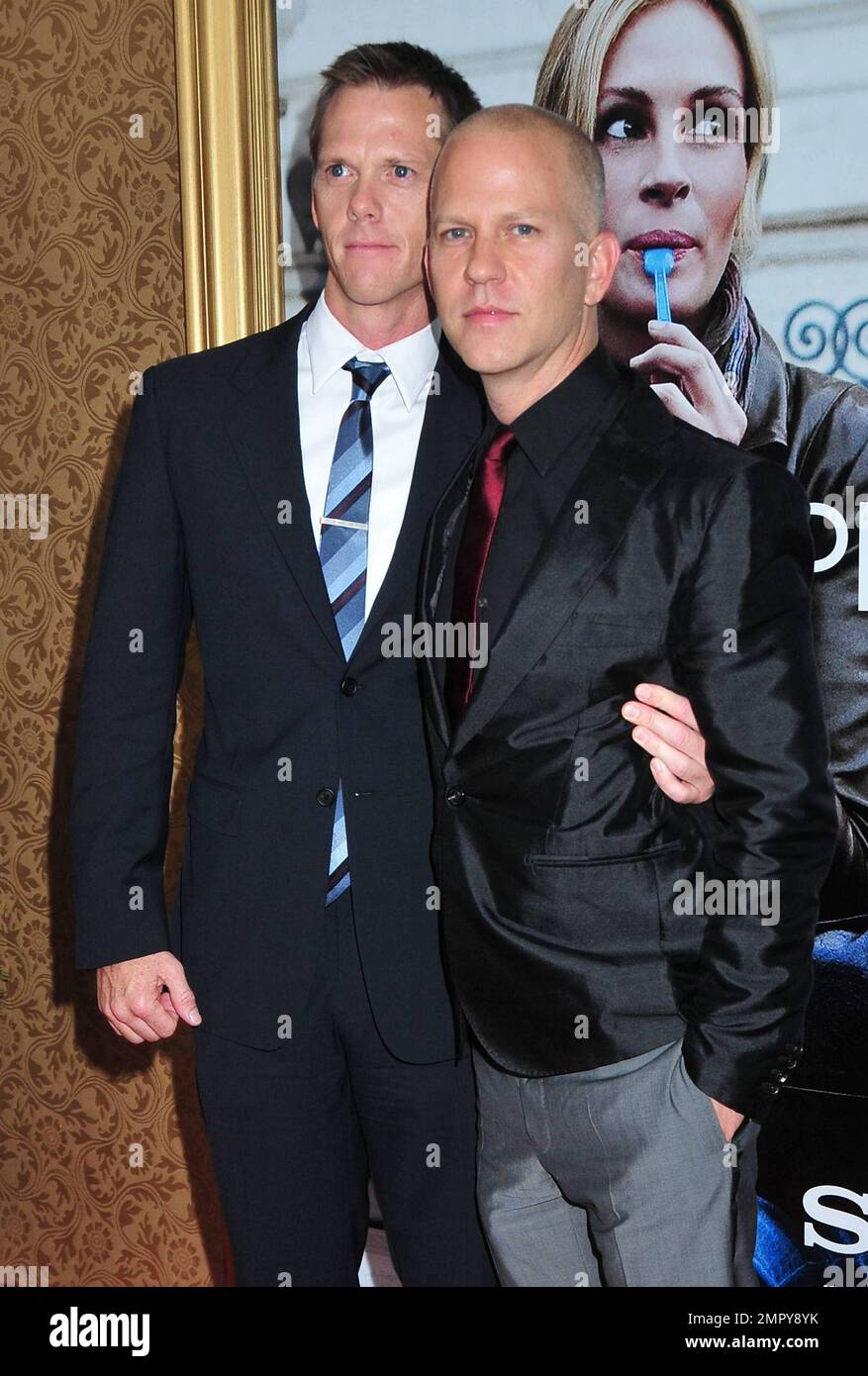 "Glee" writer Ryan Murphy (R) and boyfriend arrive at the premiere of ...