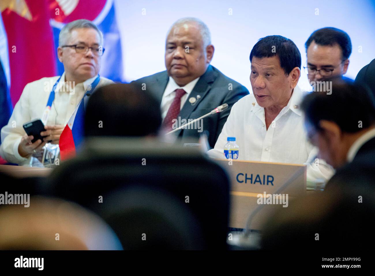 Philippine President Rodrigo Duterte, third from left, speaks during ...