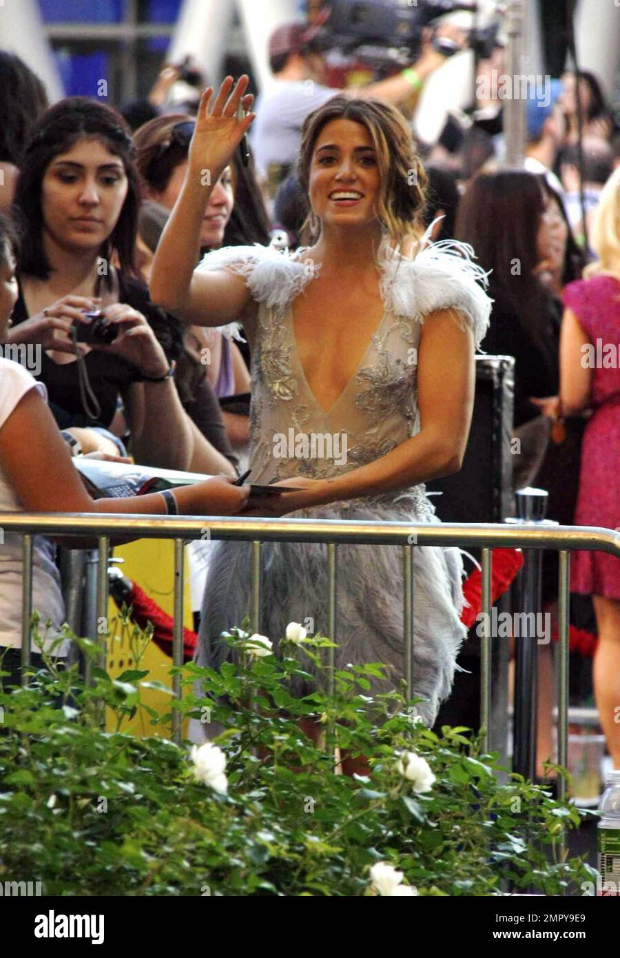 Nikki Reed signs autographs as she leaves the premiere of Twilight Saga ...