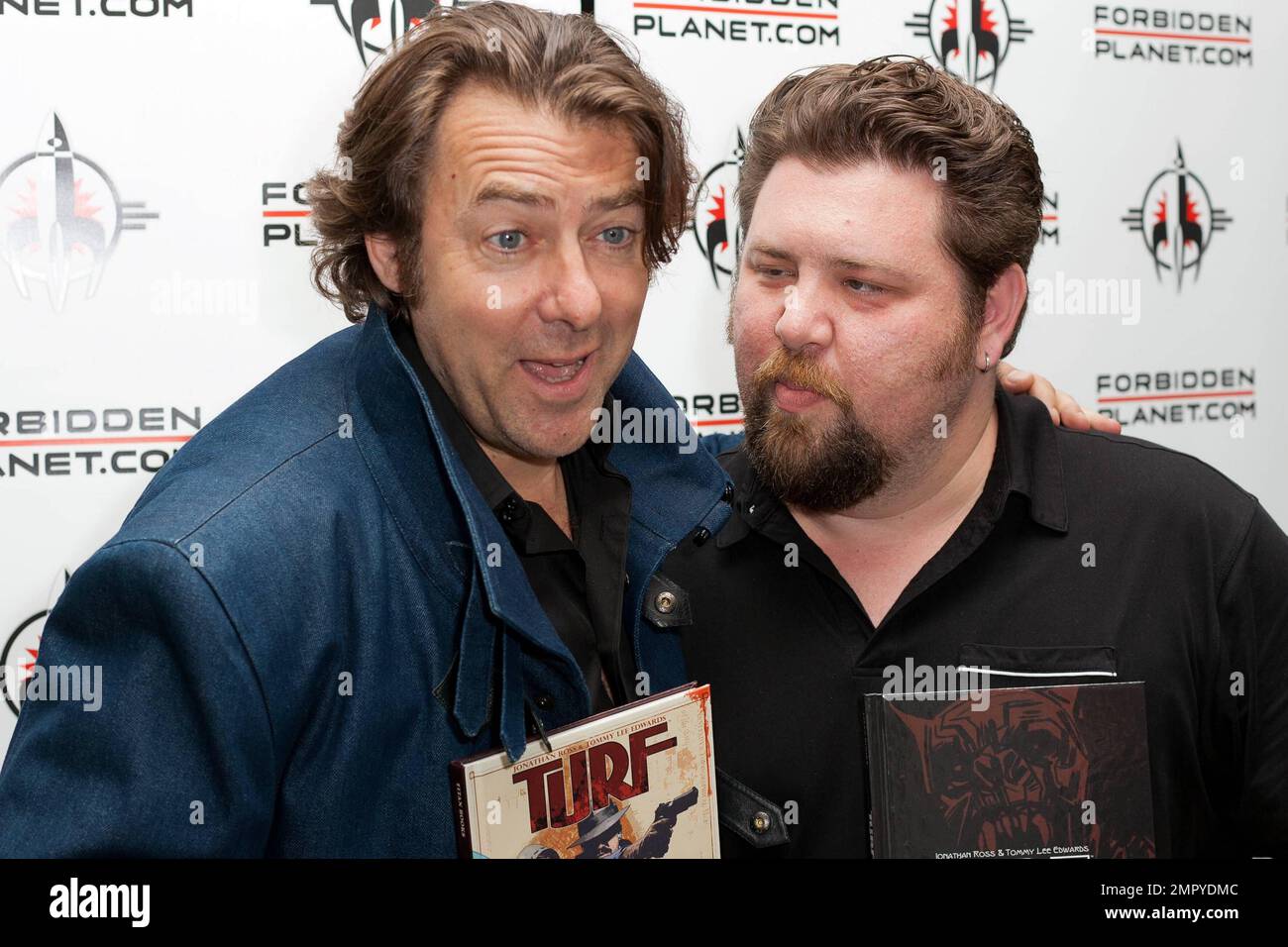 Tommy Lee Edwards and Jonathan Ross sign copies of the hardback ...
