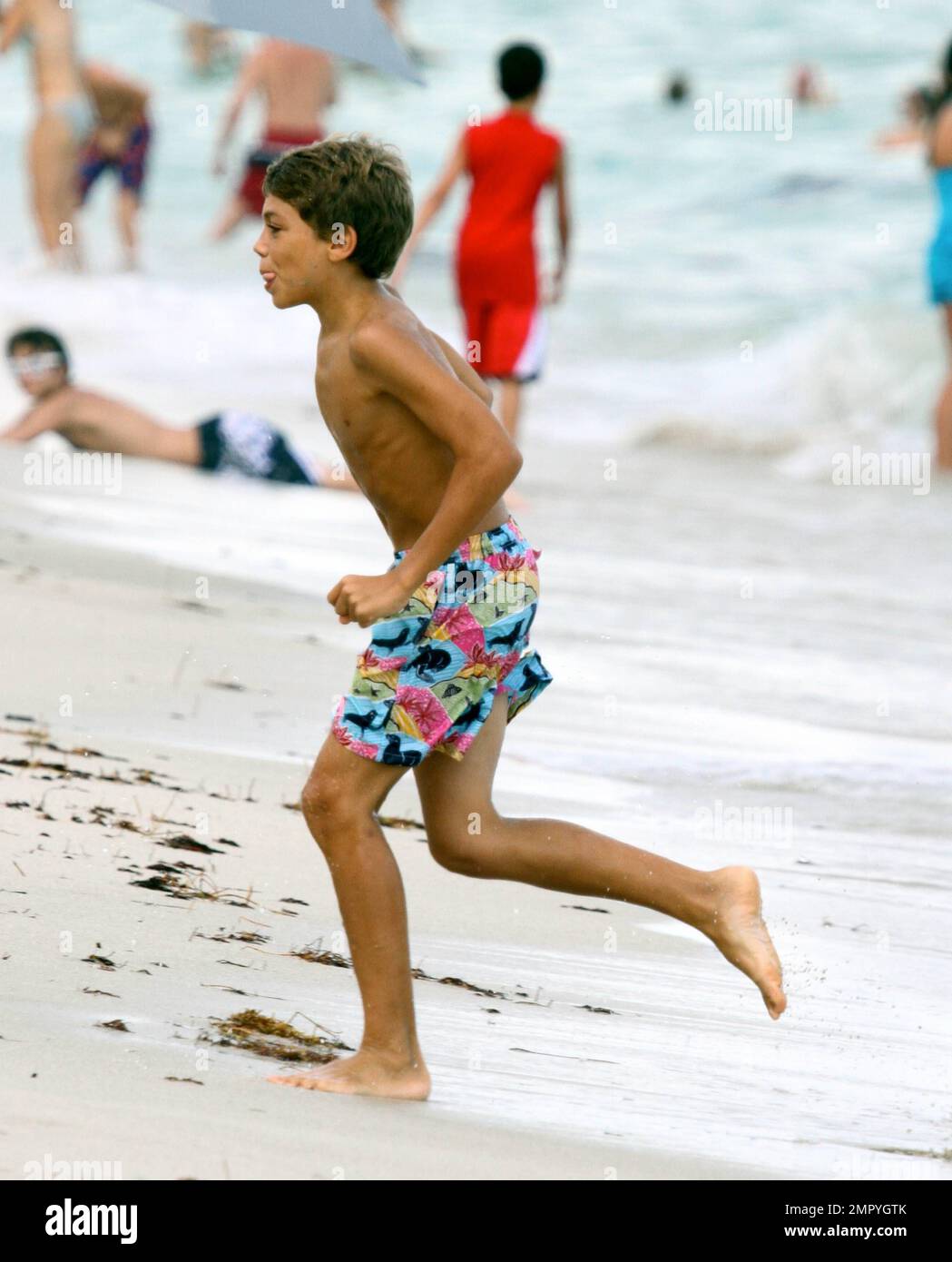 Elias Becker enjoys his 12th birthday with a pool party. On hand to ...