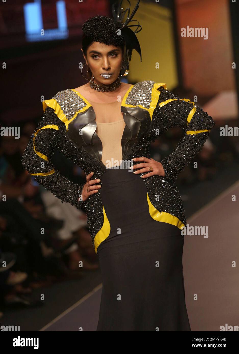 A model presents creation of designer Sundus Talpur during the "Made in ...