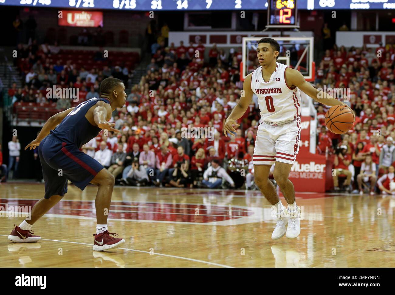 Wisconsin's D'Mitrik Trice (0) and South Carolina State's Donte Wright ...