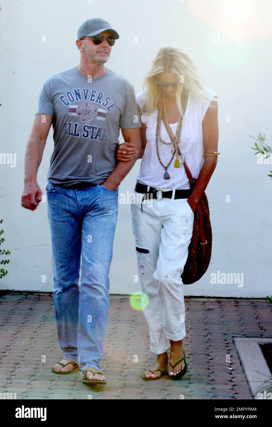 Elle Macpherson and boyfriend Roger Jenkins were spotted out and about ...