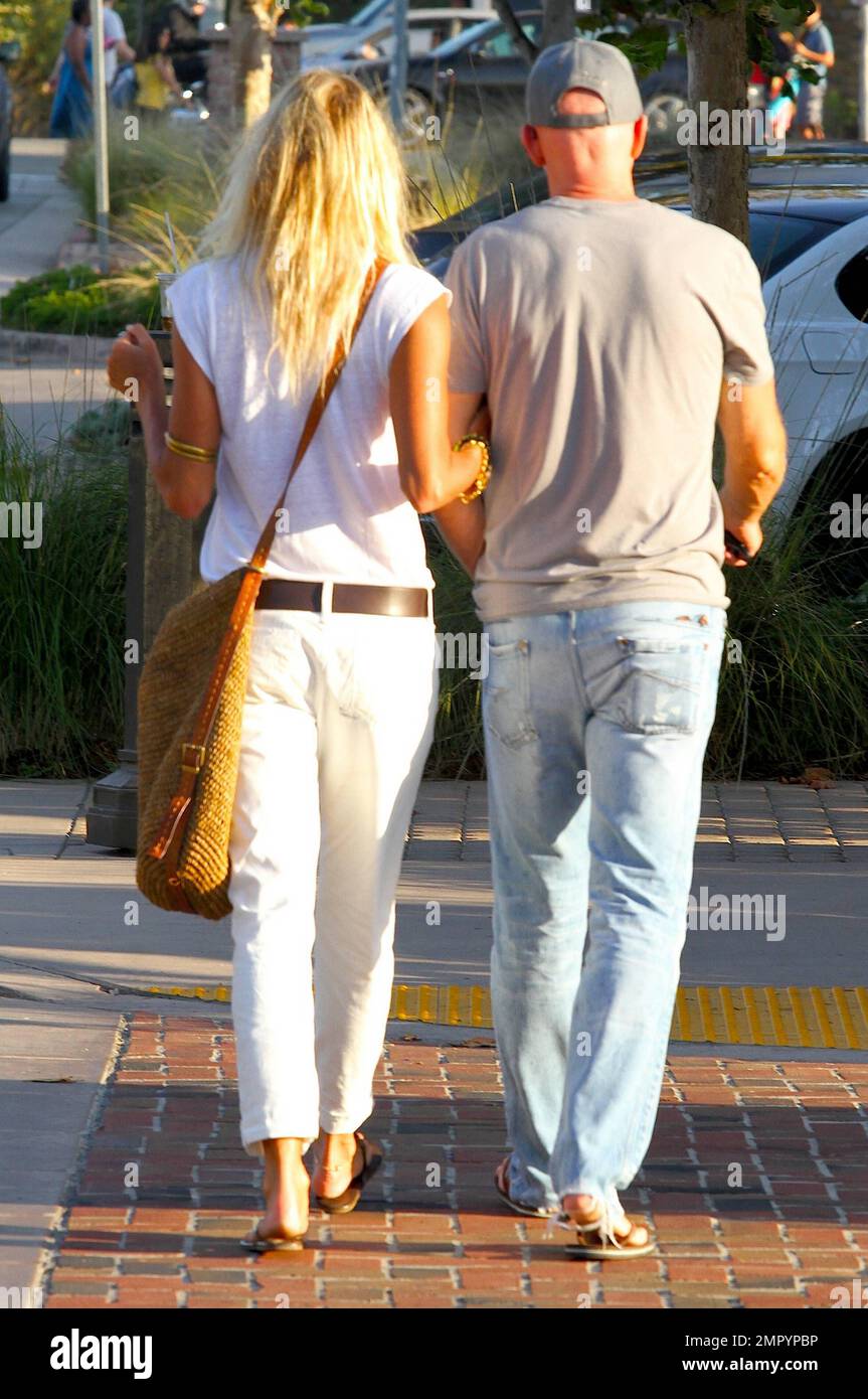 Elle Macpherson and boyfriend Roger Jenkins were spotted out and about ...
