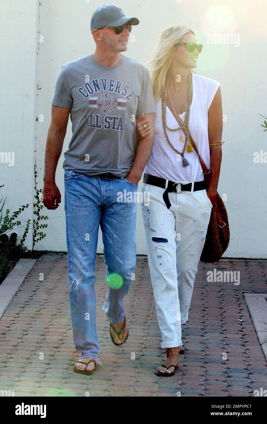 Elle Macpherson and boyfriend Roger Jenkins were spotted out and about ...