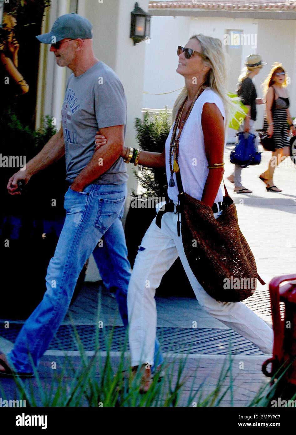 Elle Macpherson and boyfriend Roger Jenkins were spotted out and about ...