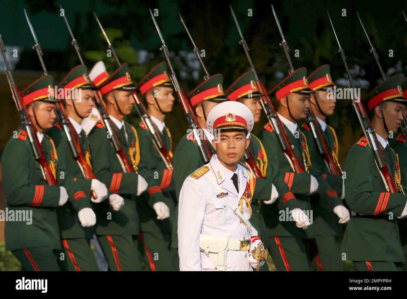 Vietnamese honor guards arrive at the Presidential Palace in Hanoi ...