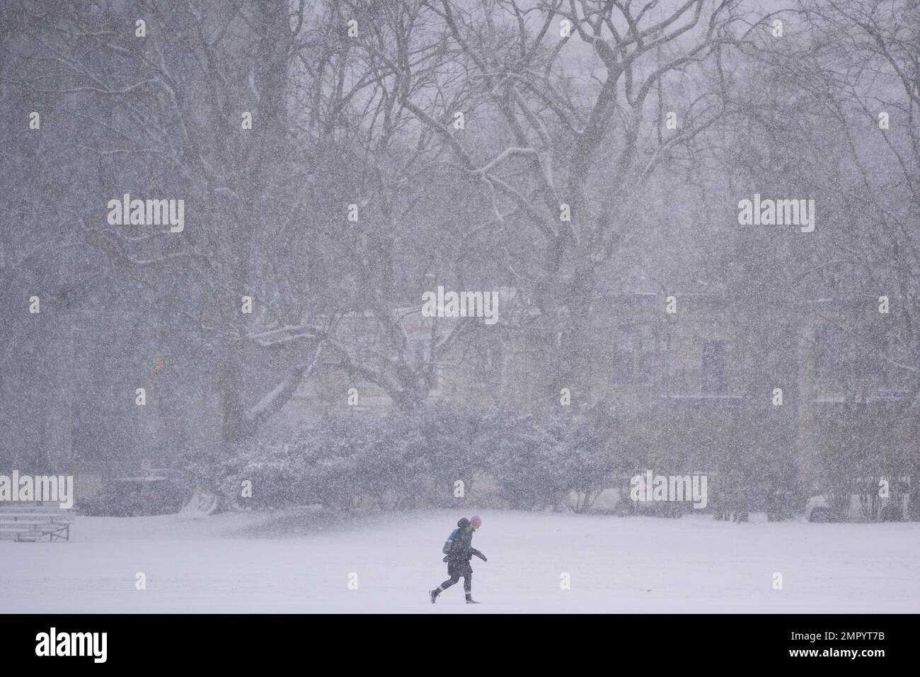 A pedestrian makes their way through a snowstorm in Halifax on Tuesday ...