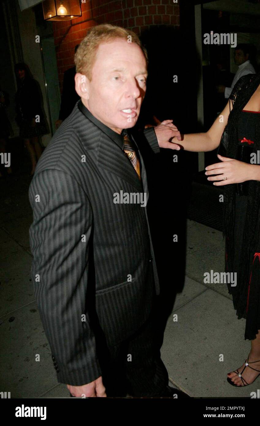 PR man Elliott Mintz arrives at Mr. Chow with mysterious Miss M and ...