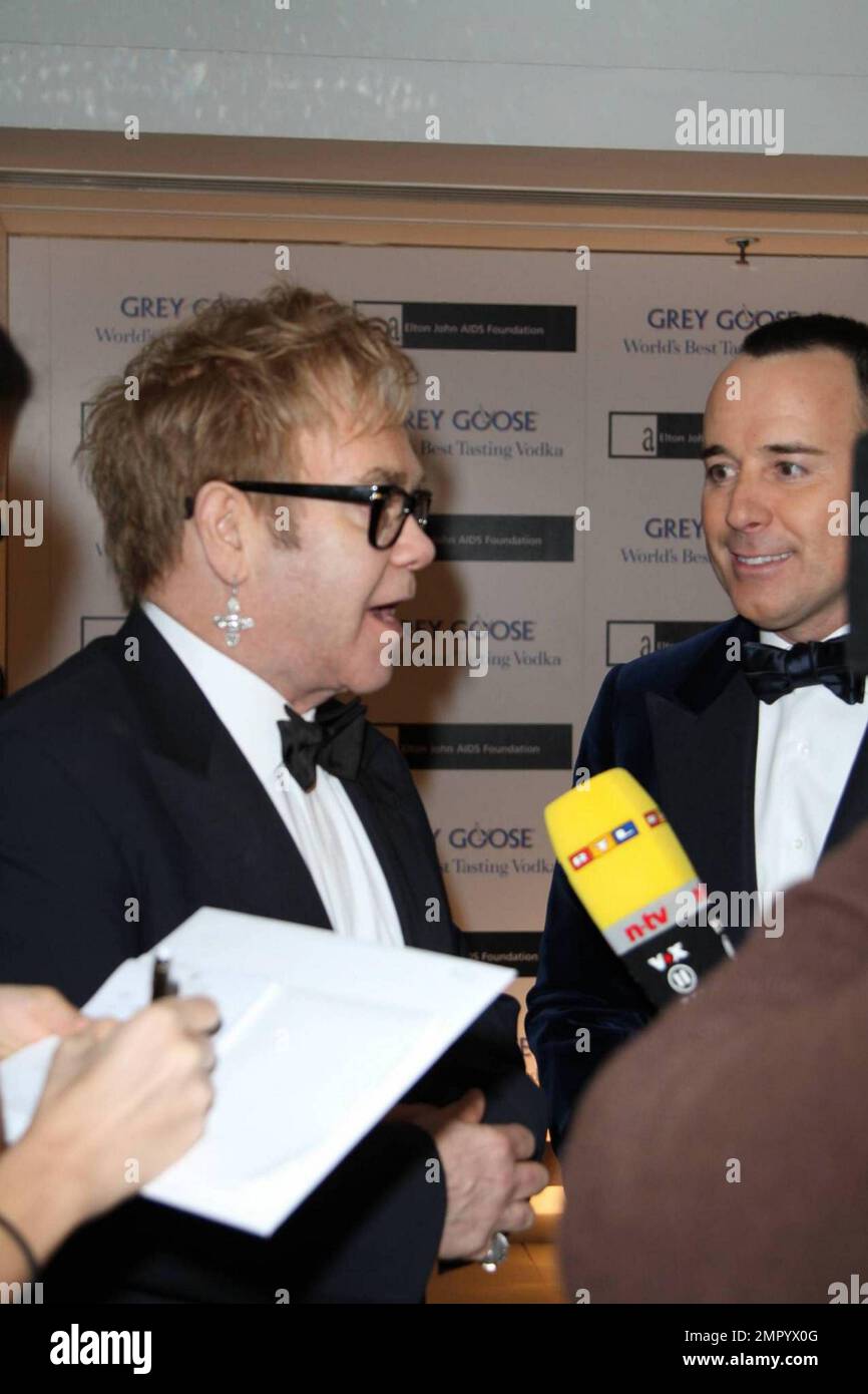 Elton John and David Furnish at the Grey Goose Character and Cocktails ...