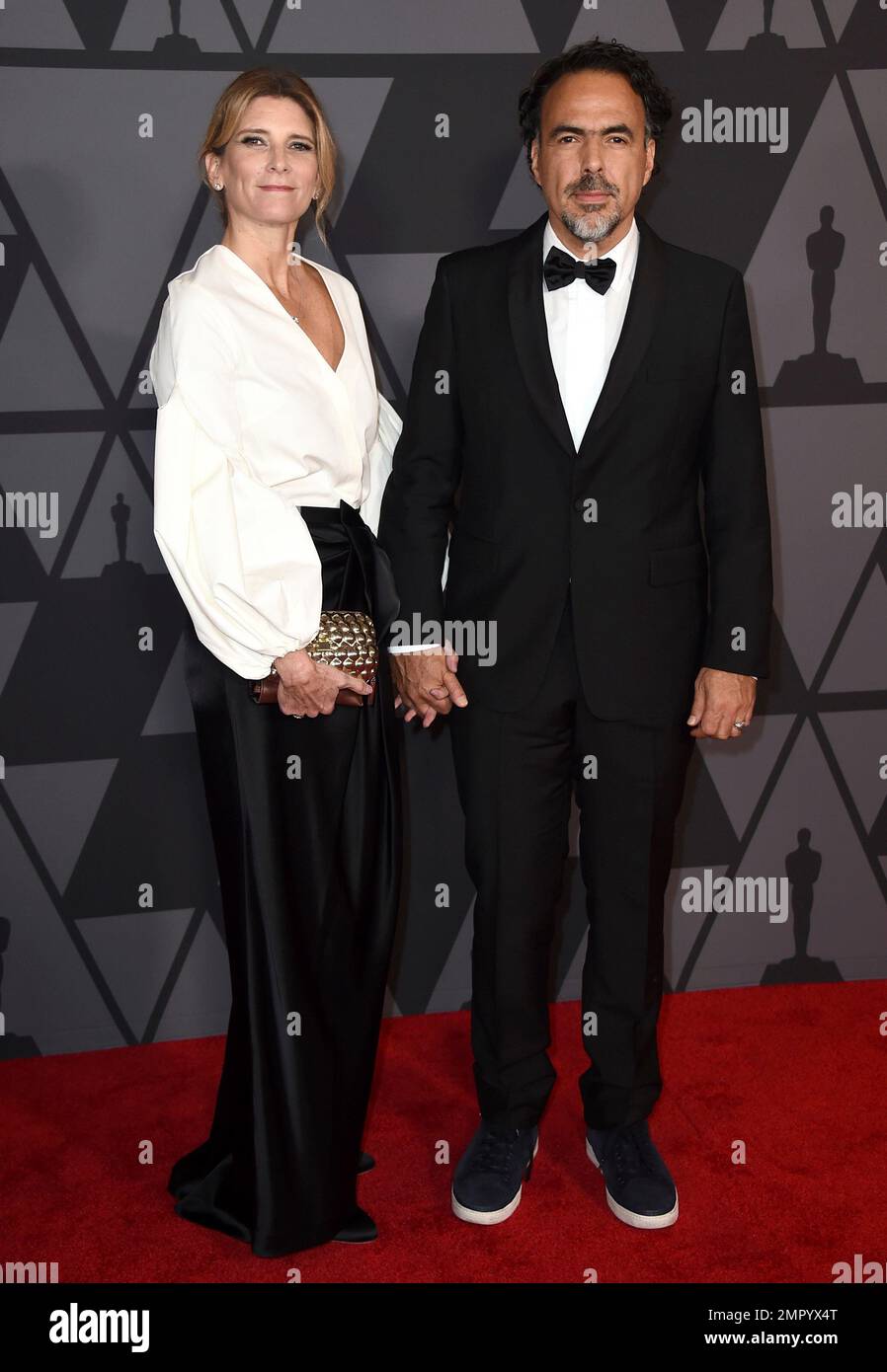 Alejandro Gonzalez Inarritu, right, and Maria Eladia Hagerman arrive at ...