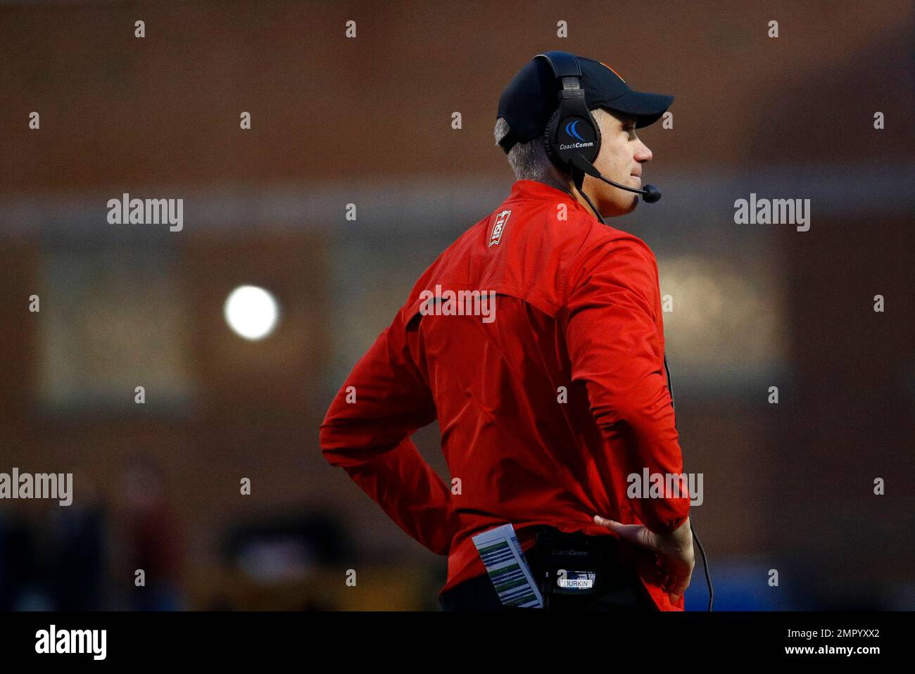 Maryland head coach DJ Durkin stands on the field in the first half of ...