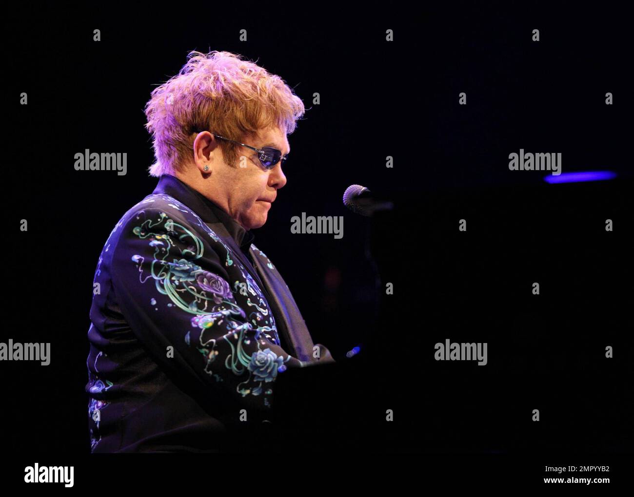 Elton John performs live in concert at the Royal Opera House in London ...