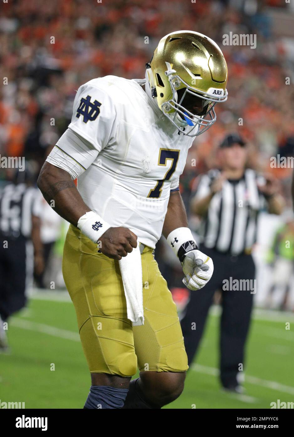 Notre Dame quarterback Brandon Wimbush (7) walks off the field after ...