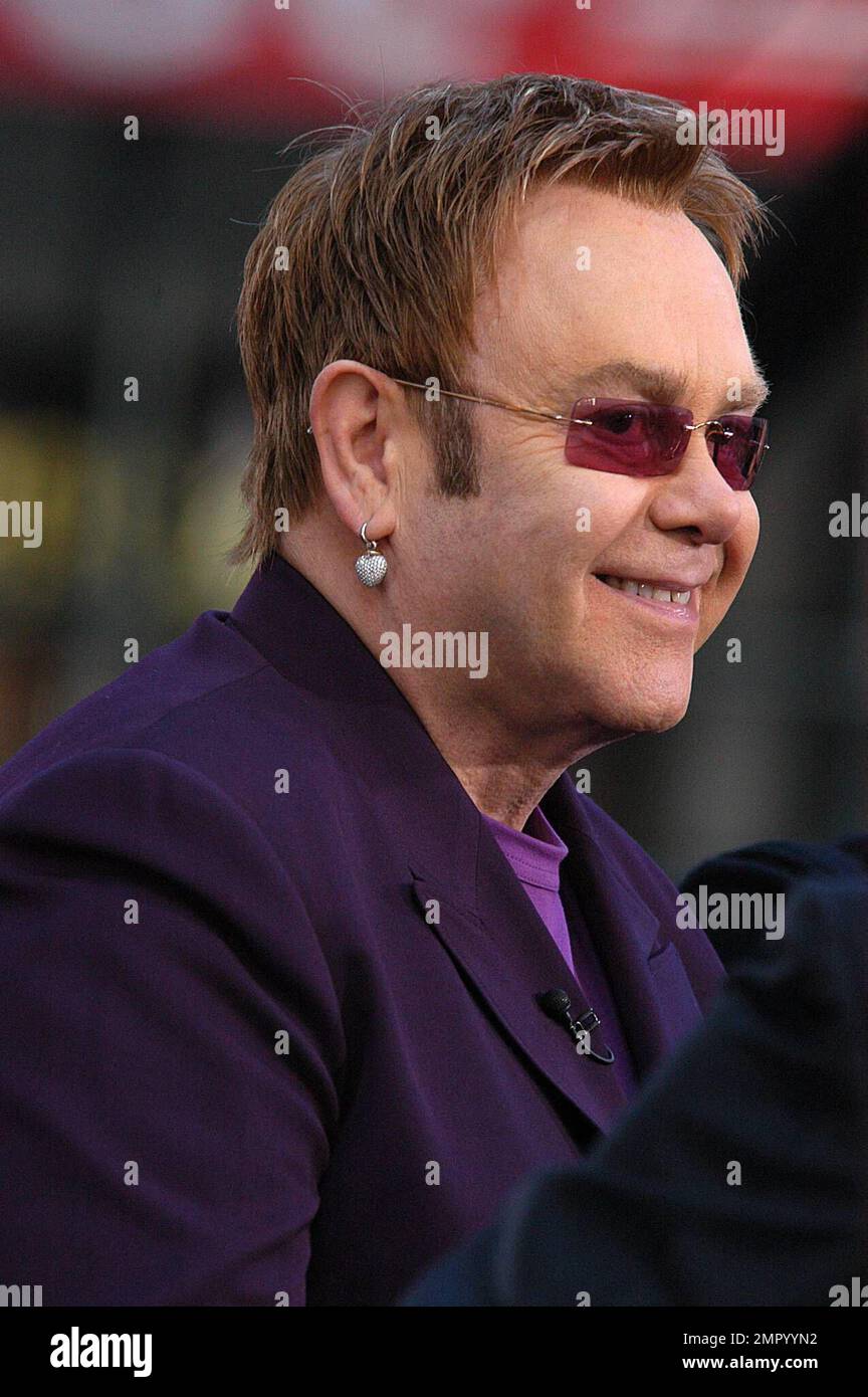 Sir Elton John flies the flag with his sequined Union Jack shoes as he ...
