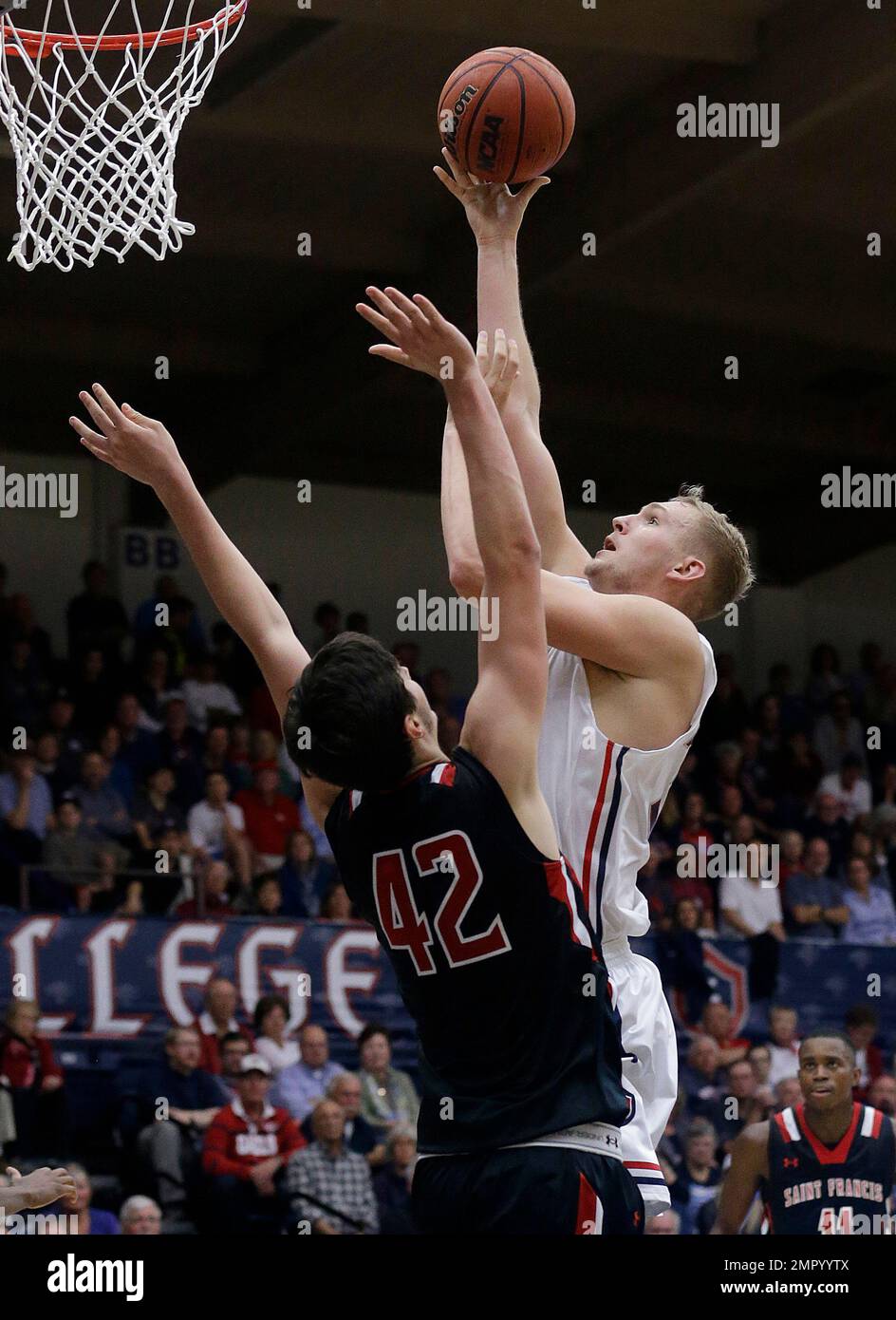 St. Mary's (Calif.) center Jock Landale, right, shoots over St. Francis ...