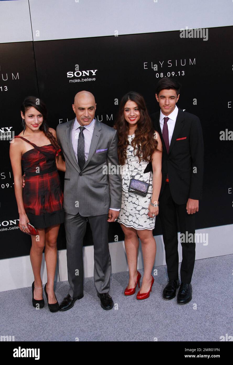 Faran Tahir and family at the world premiere of her movie "Elysium" at ...