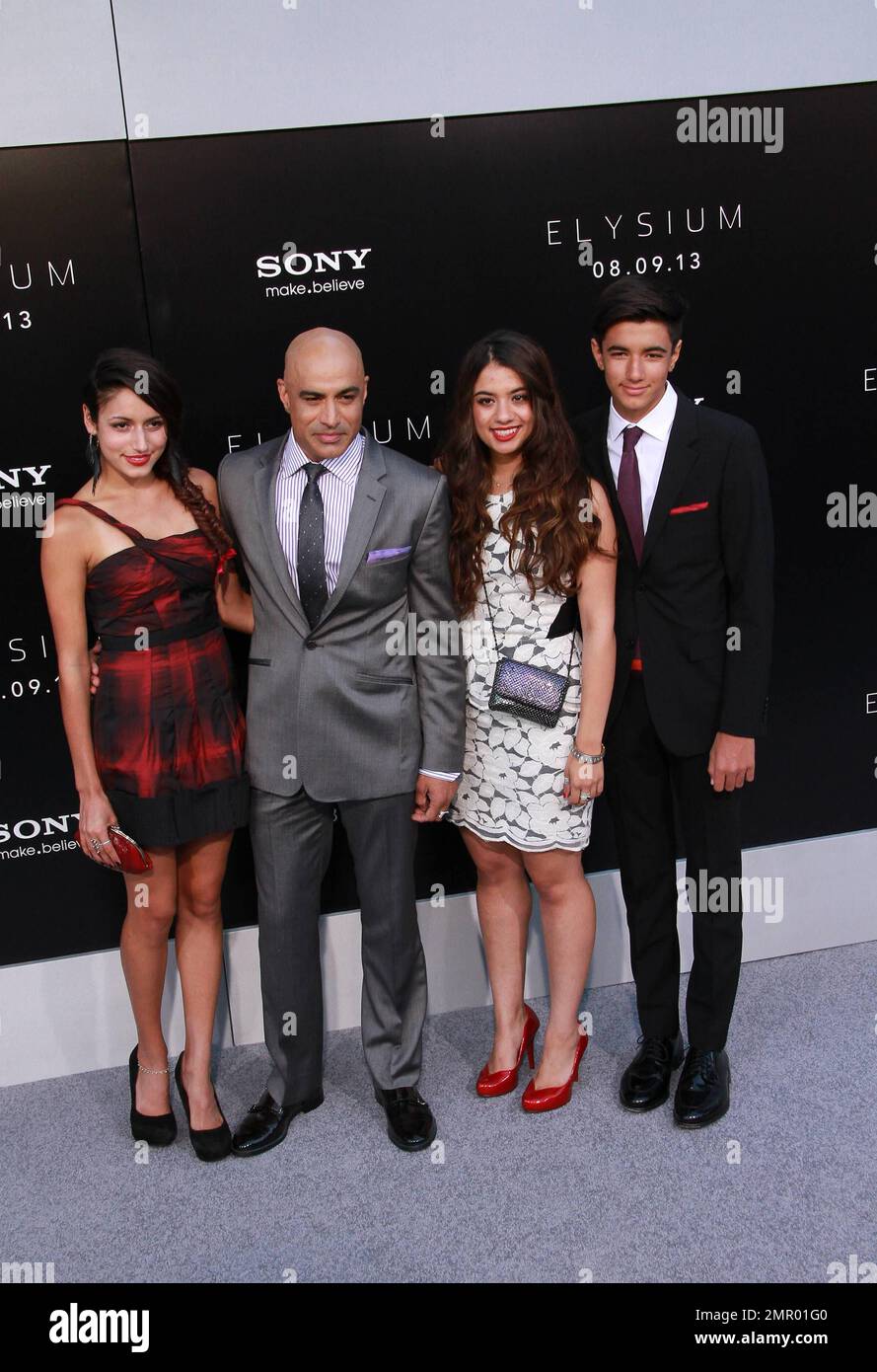 Faran Tahir and family at the world premiere of her movie "Elysium" at ...