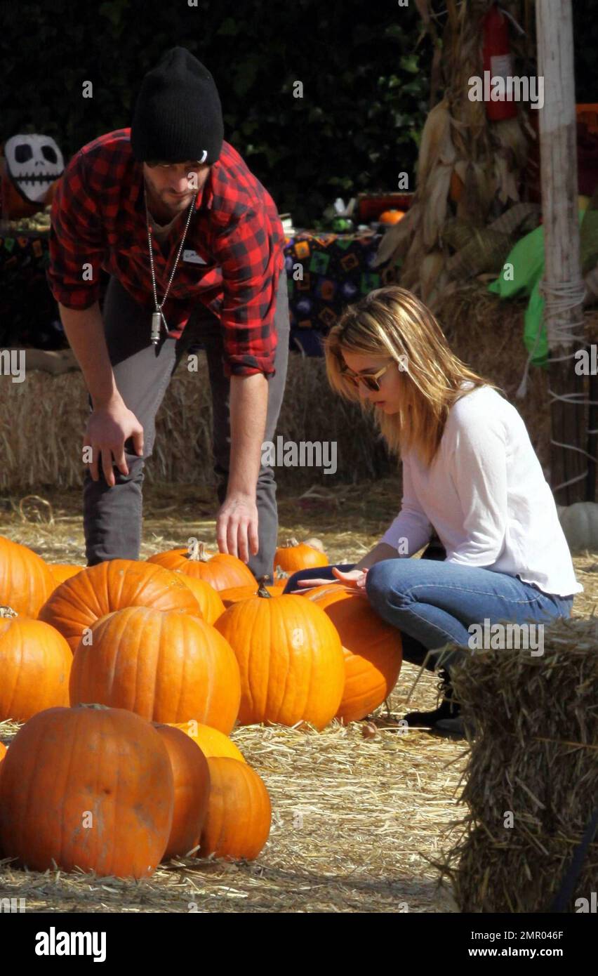 Emma Roberts spends an afternoon picking out a perfect pumpkin with a friend at Mr Bones ...