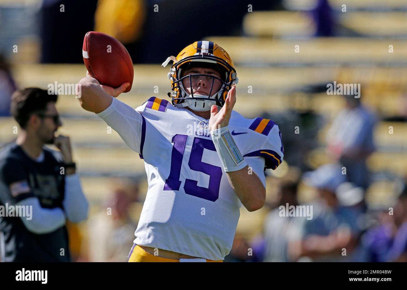 LSU quarterback Myles Brennan (15) warms up before an NCAA college ...