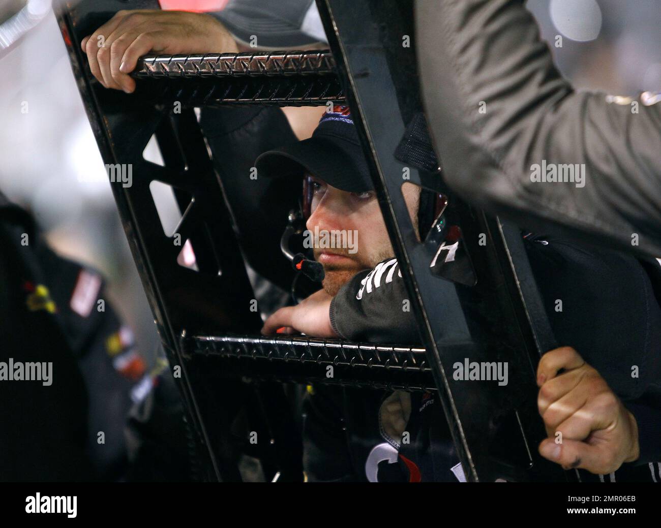 A pit crew member for driver Noah Gragson watches a monitor after ...