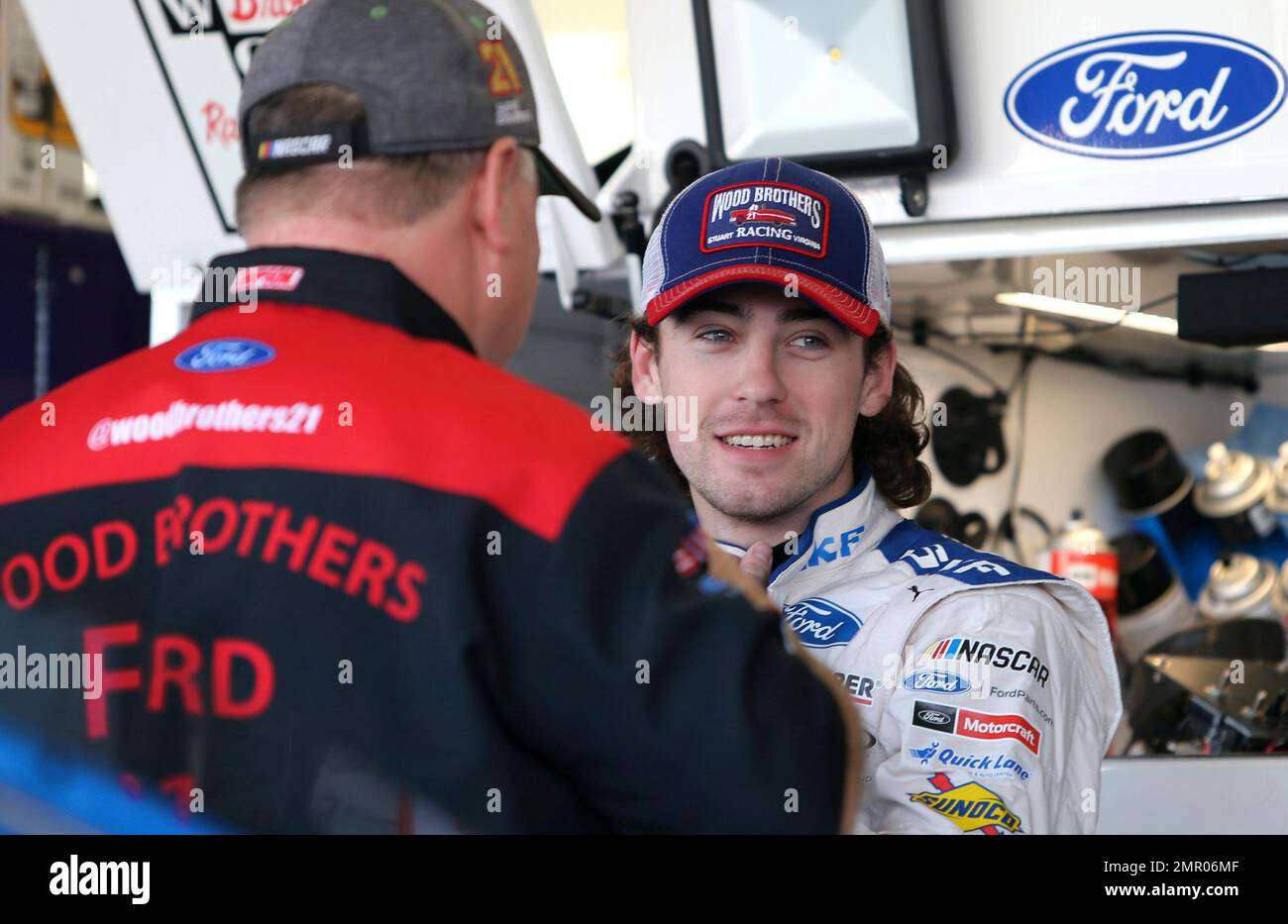 Ryan Blaney, right, talks with a pit crew member before practice for ...