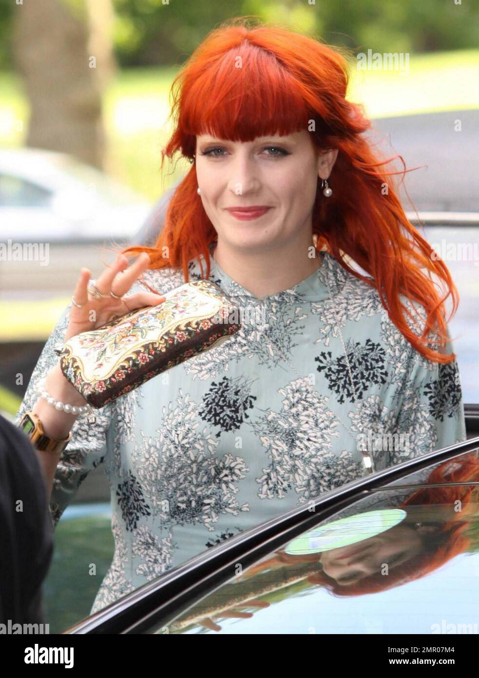 Florence Welch, lead singer of Florence and the Machine, shows off her ...