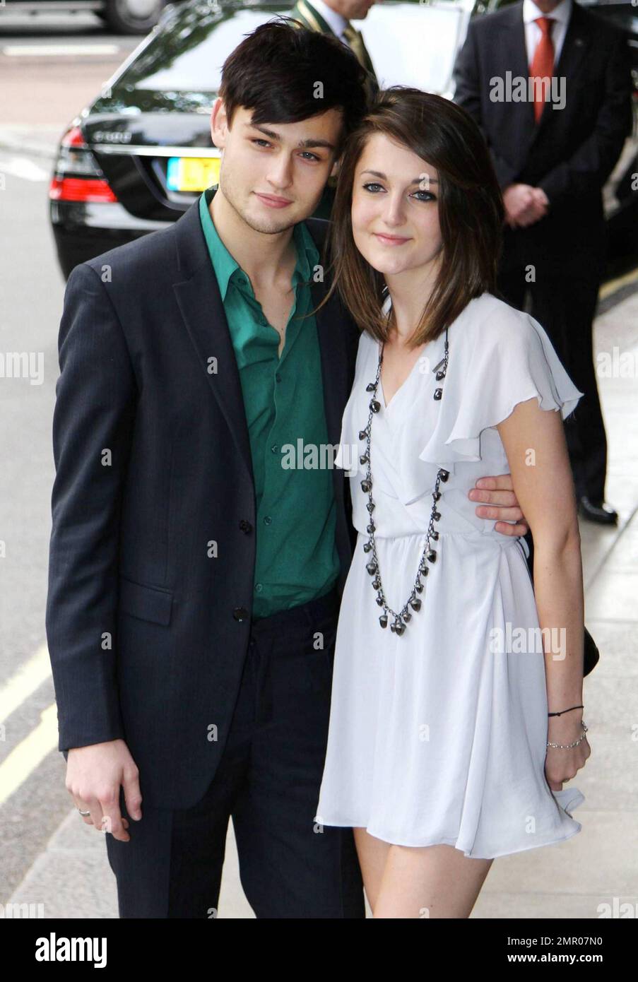 Douglas Booth and his girlfriend pose for the camera at the English ...