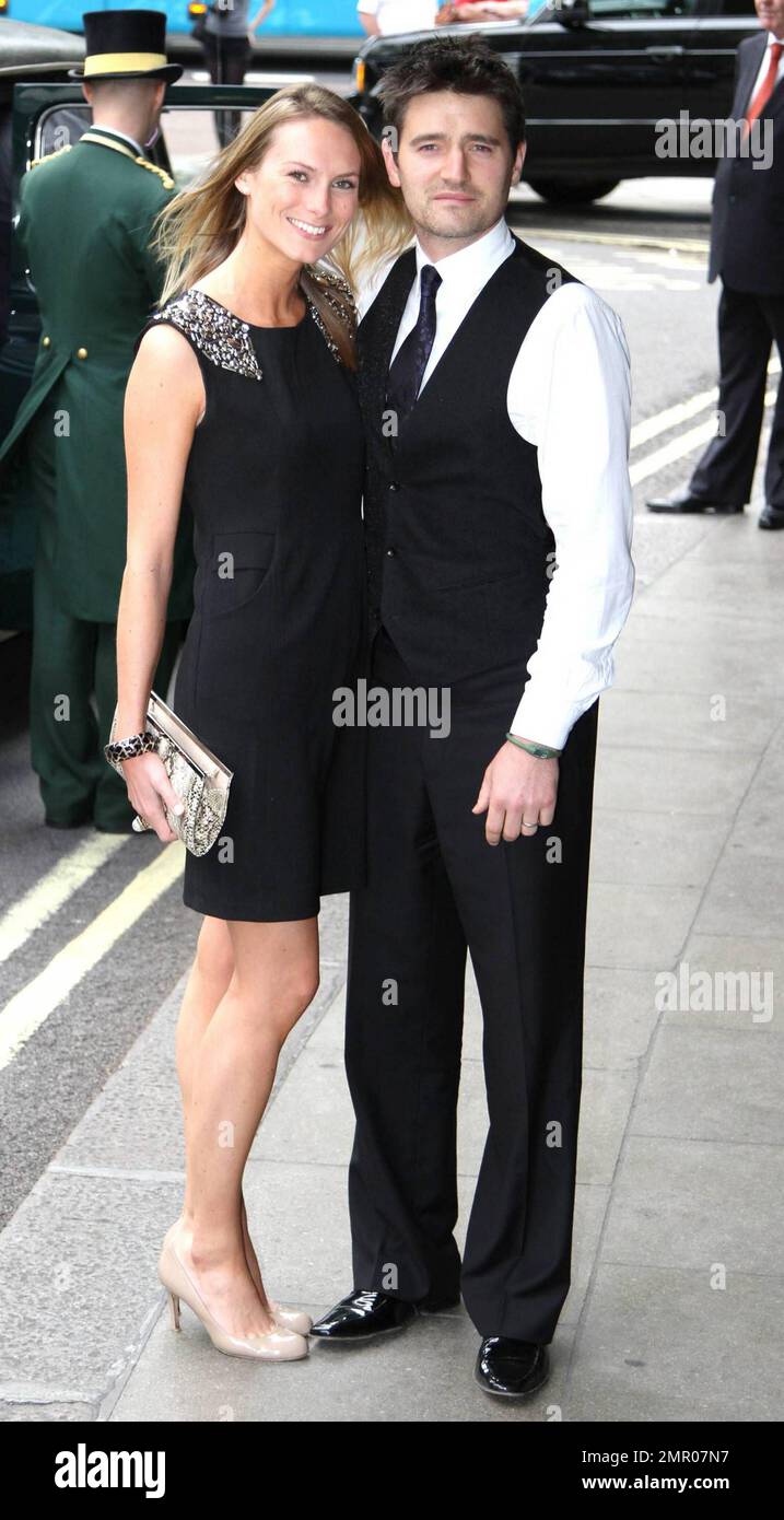 Tom Chambers and wife Clare Harding pose for the camera at the English ...