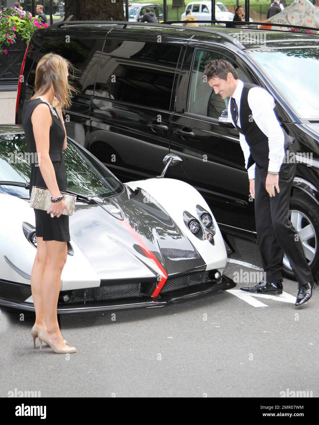 Tom Chambers and wife Clare Harding check out a super swank Pagani ...