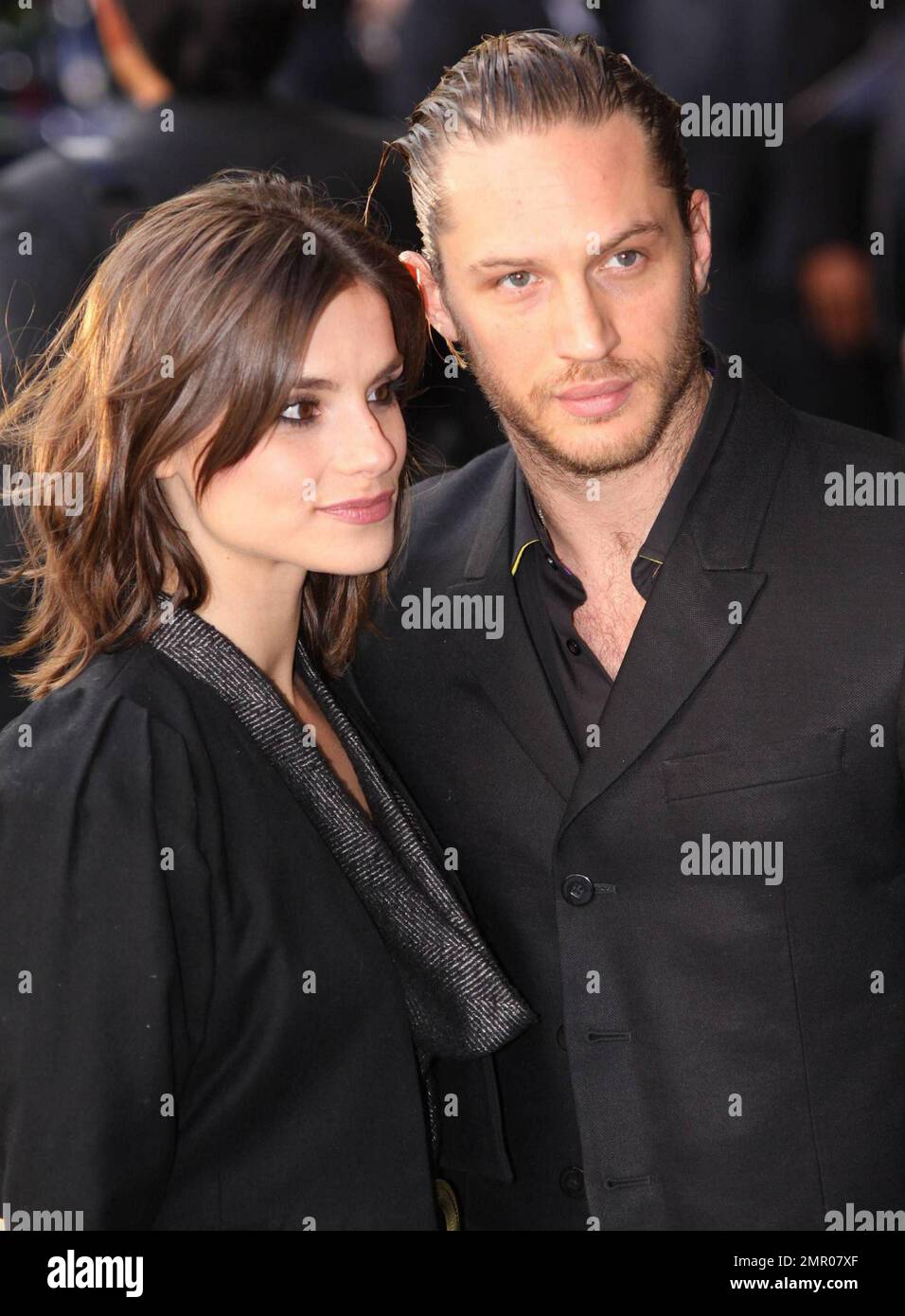 Tom Hardy and Charlotte Riley pose for the camera at the English ...