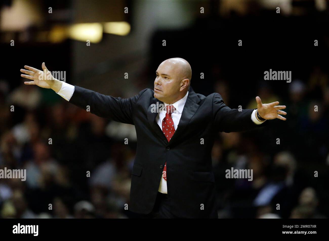 Austin Peay head coach Matt Figger directs his team in the first half ...