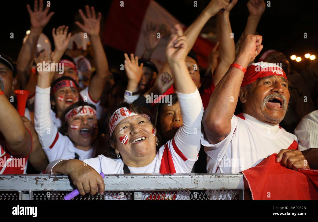 Peru fans cheer while watching a World Cup qualifying payoff soccer ...