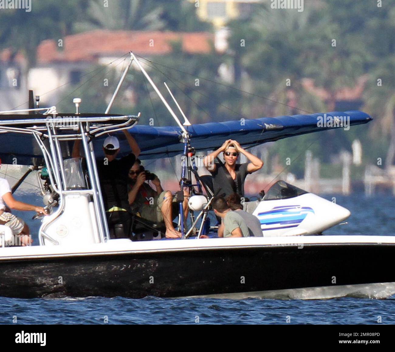 EXCLUSIVE!! Pop music superstar Enrique Iglesias takes to the waves and ...